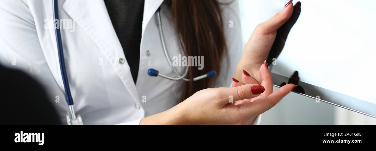 Female doctor hands hold and show digital Stock Photo - Alamy