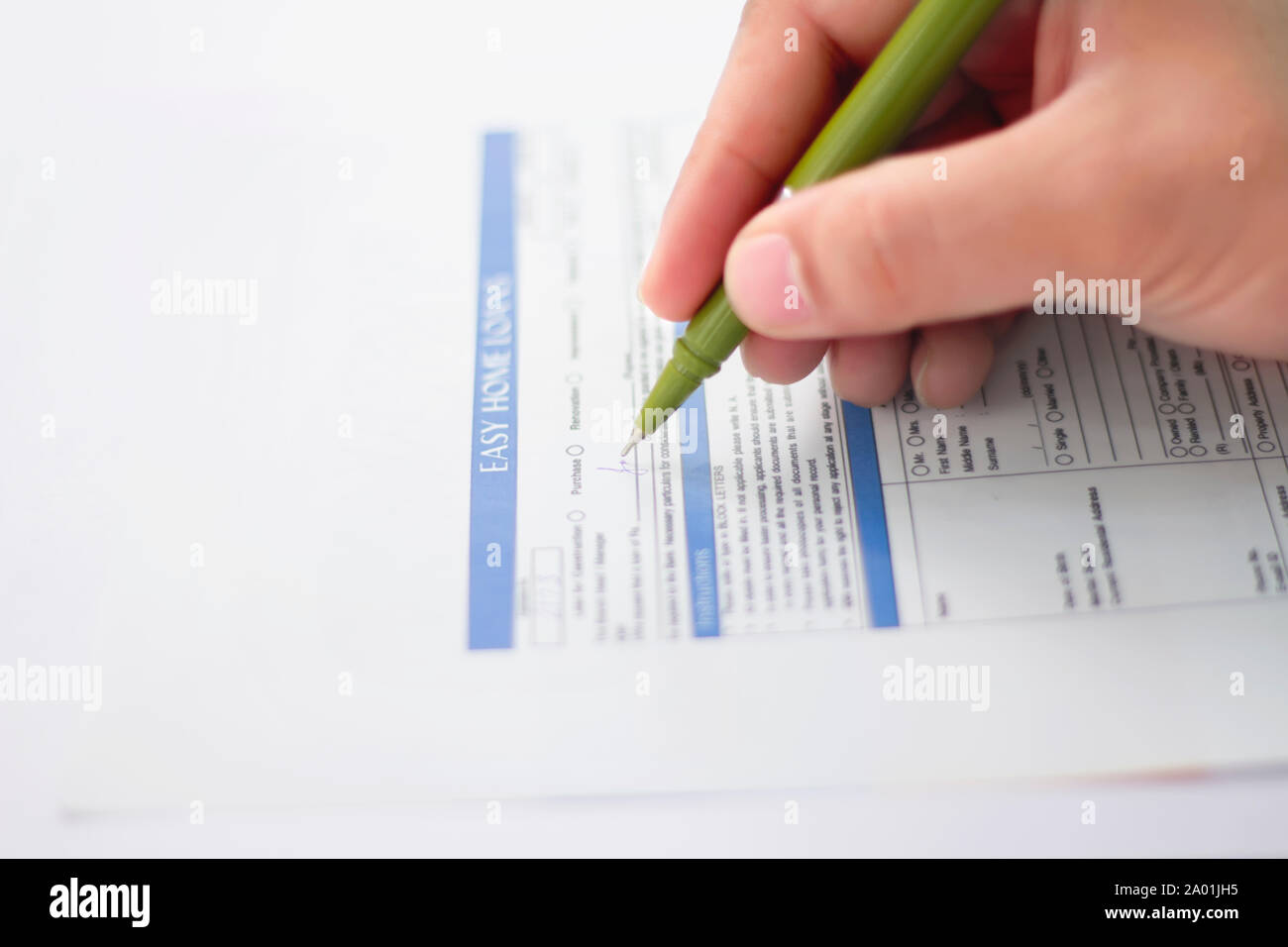 Picture of man working paperwork with a pen. Isolated on a white ...