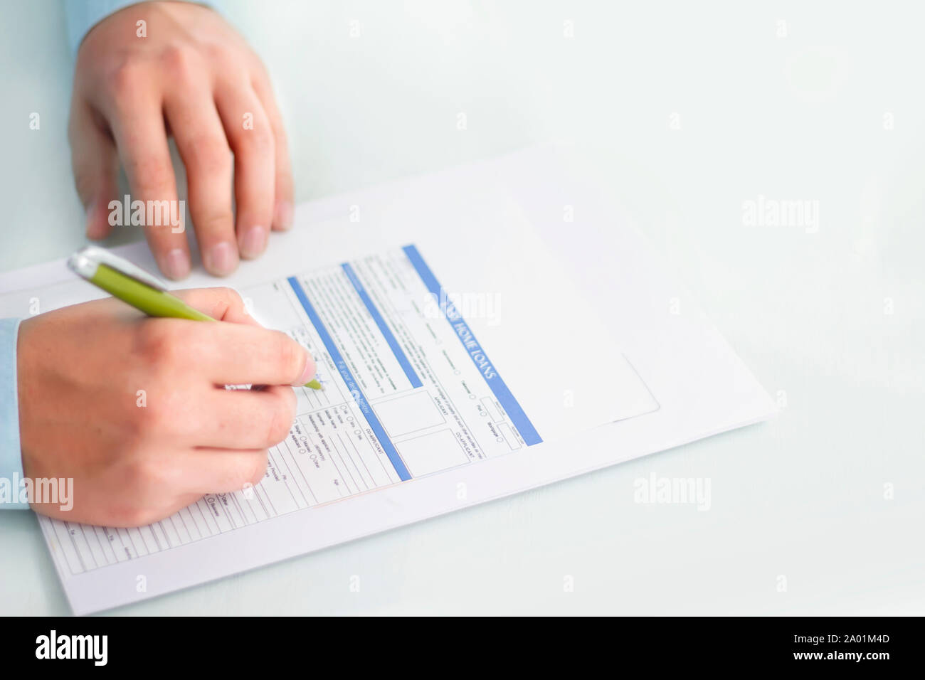 Picture of man working paperwork with a pen. Isolated on a white ...