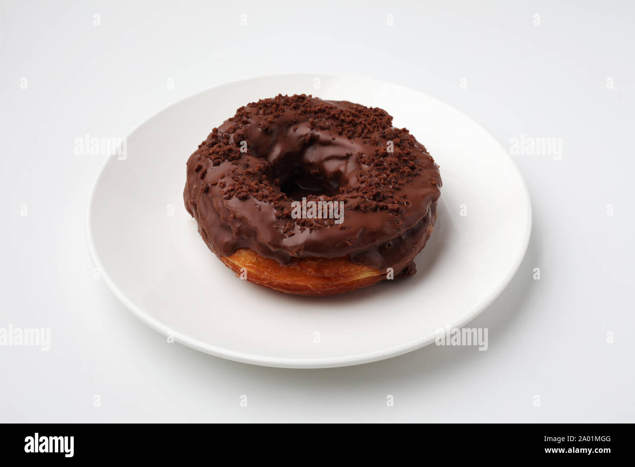 chocolate frosted doughnut on plate isolated on white background Stock ...