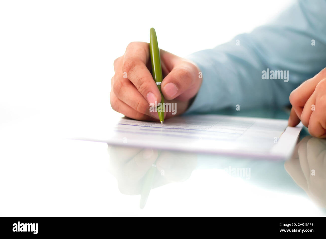 Picture of man working paperwork with a pen. Isolated on a white ...