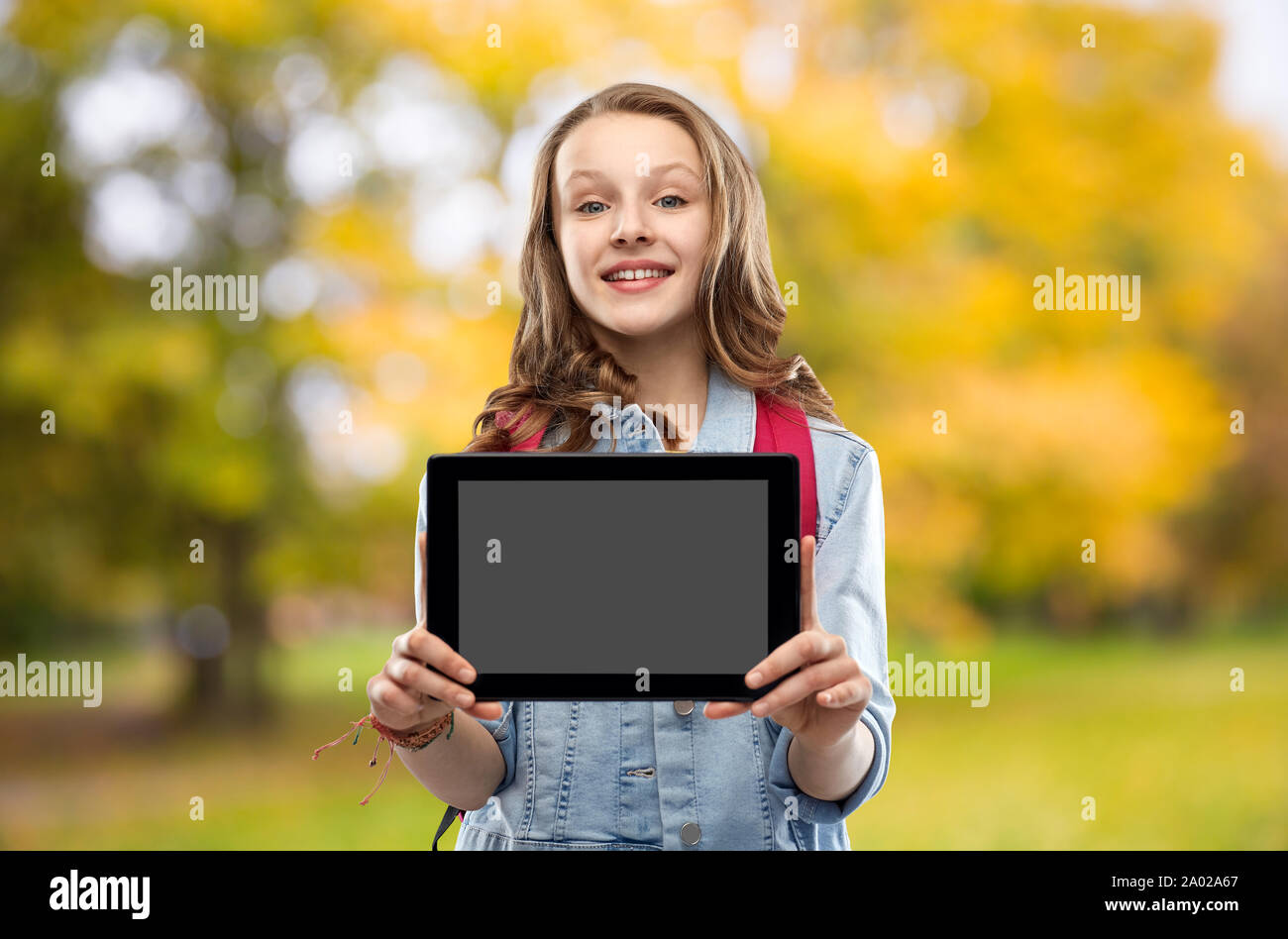 student girl with school bag and tablet computer Stock Photo - Alamy