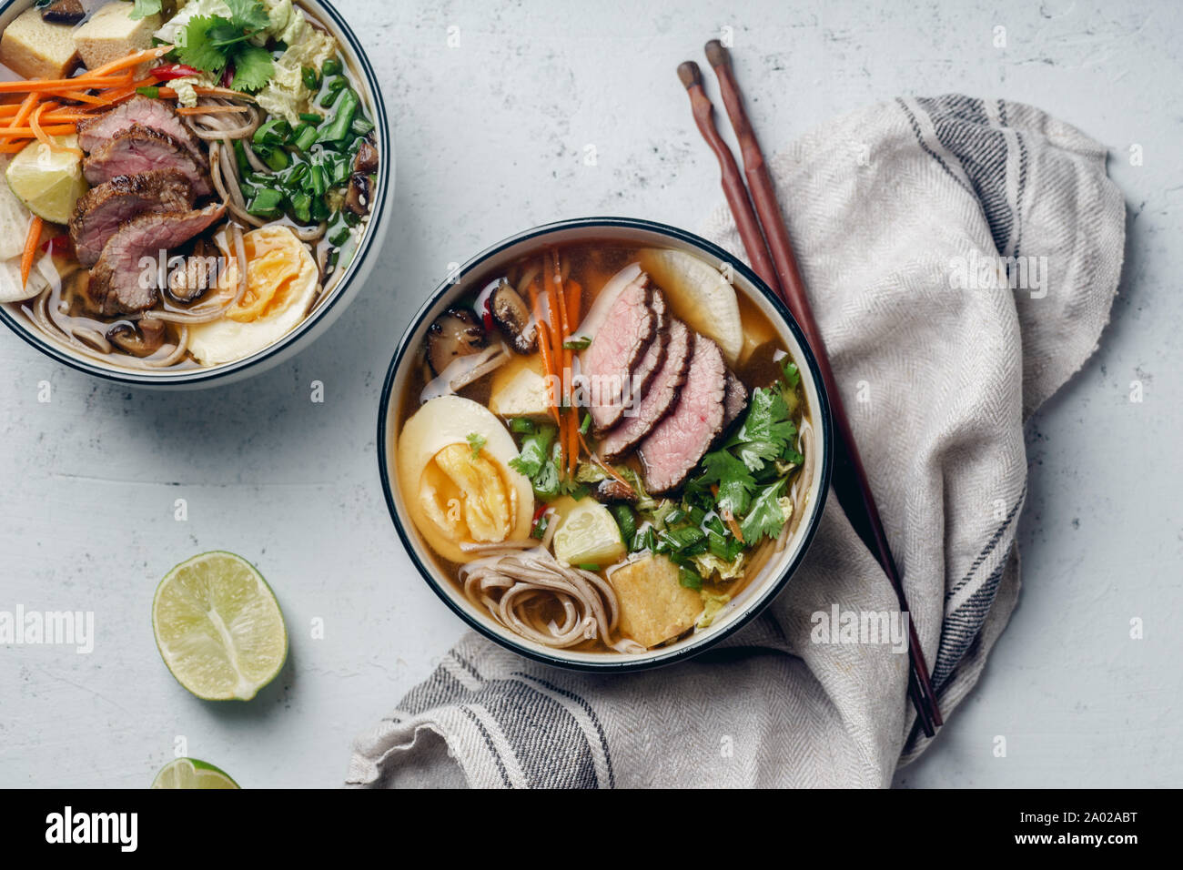 Miso ramen with roasted beef, shiitake mushrooms, fried tofu, leek and ...