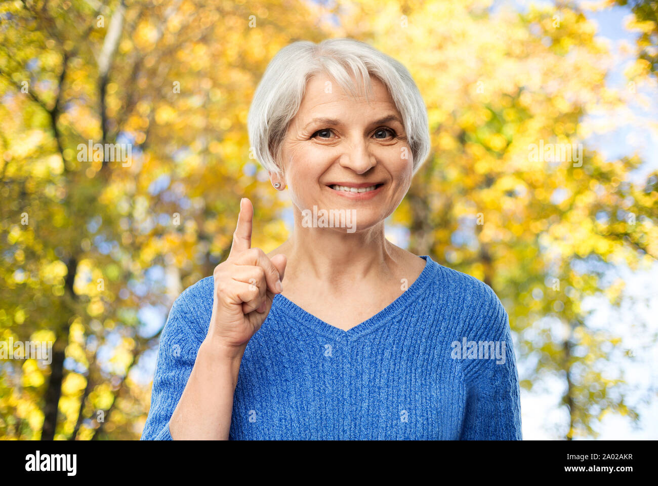 Finger pointing to tree hi-res stock photography and images - Alamy