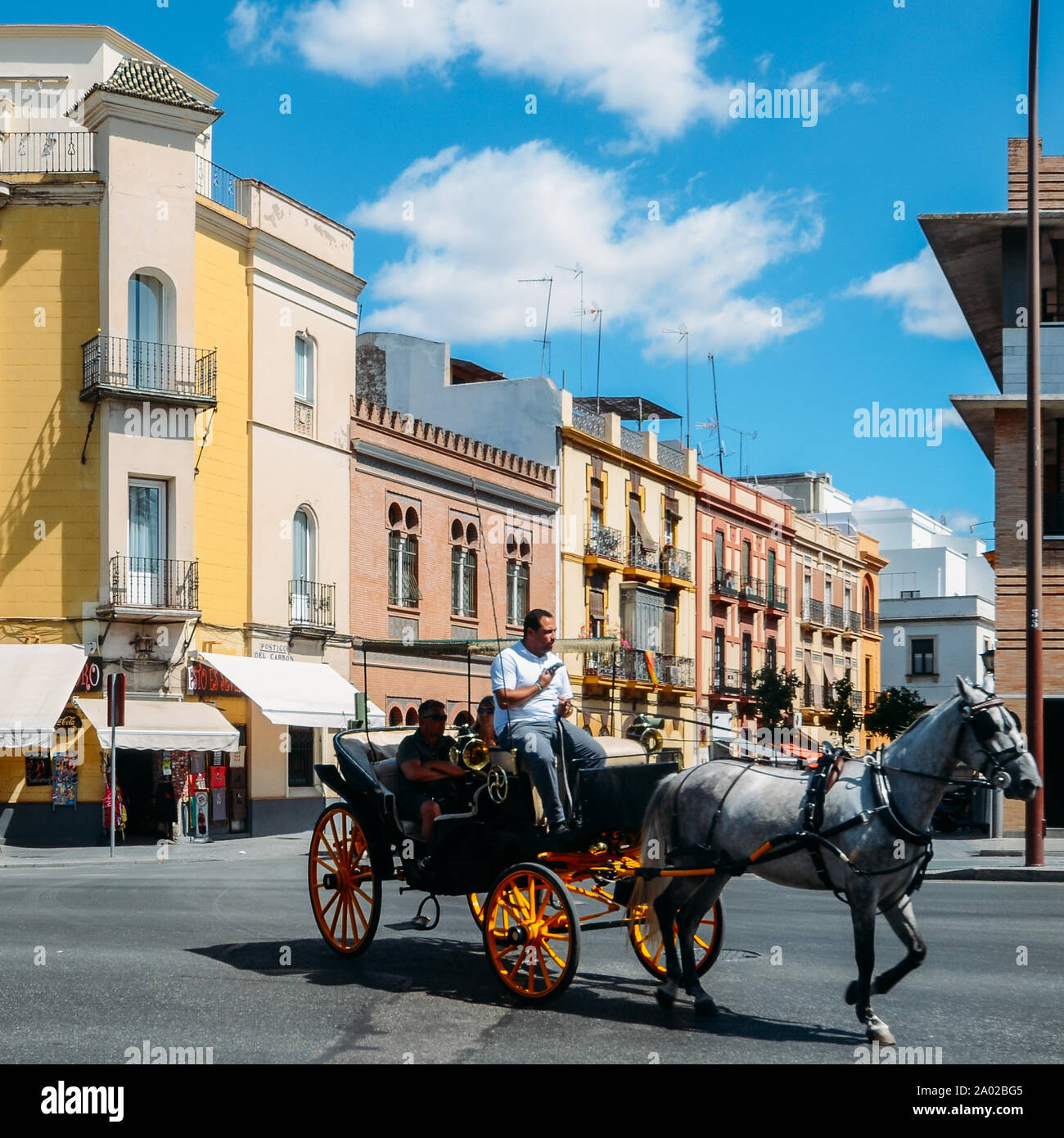 Seville, Spain - Sept 10, 2019: Old horse drawn carriage carrying ...