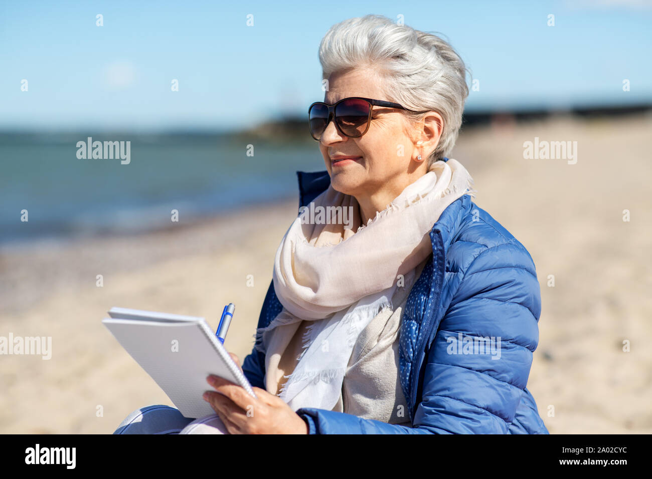 Old woman writing hi-res stock photography and images - Alamy
