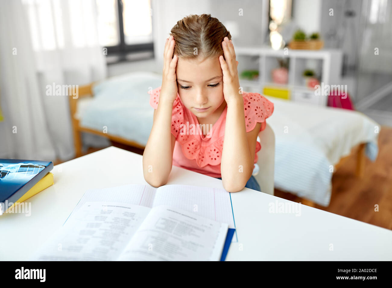 sad student girl with notebook at home Stock Photo - Alamy