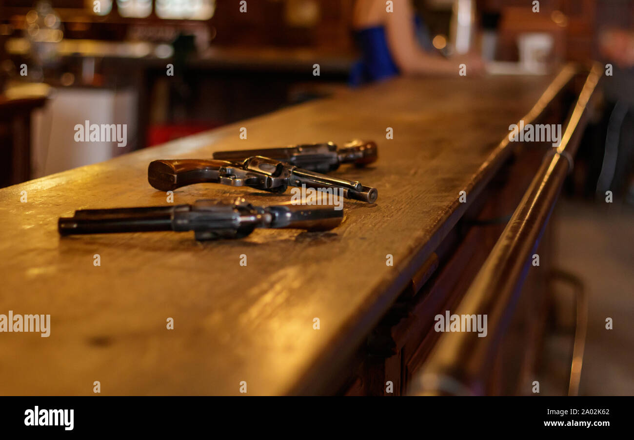 Three revolvers on a bar hi-res stock photography and images - Alamy