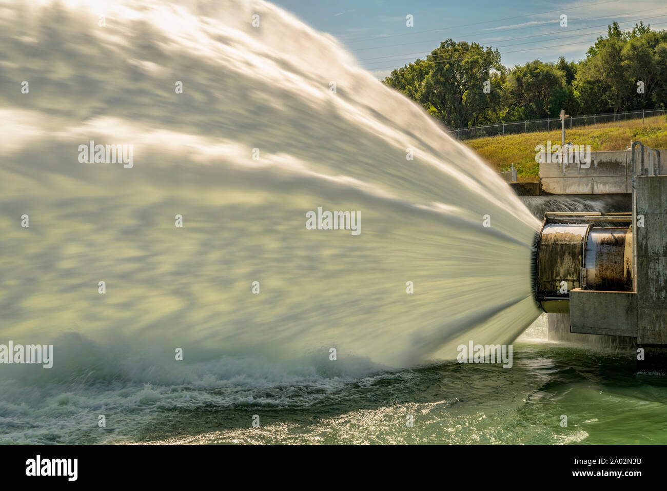 water release from turbines of hydro electric power plant Stock Photo ...