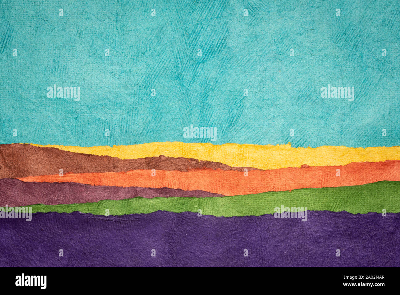 abstract landscape created with sheets of textured colorful handmade ...