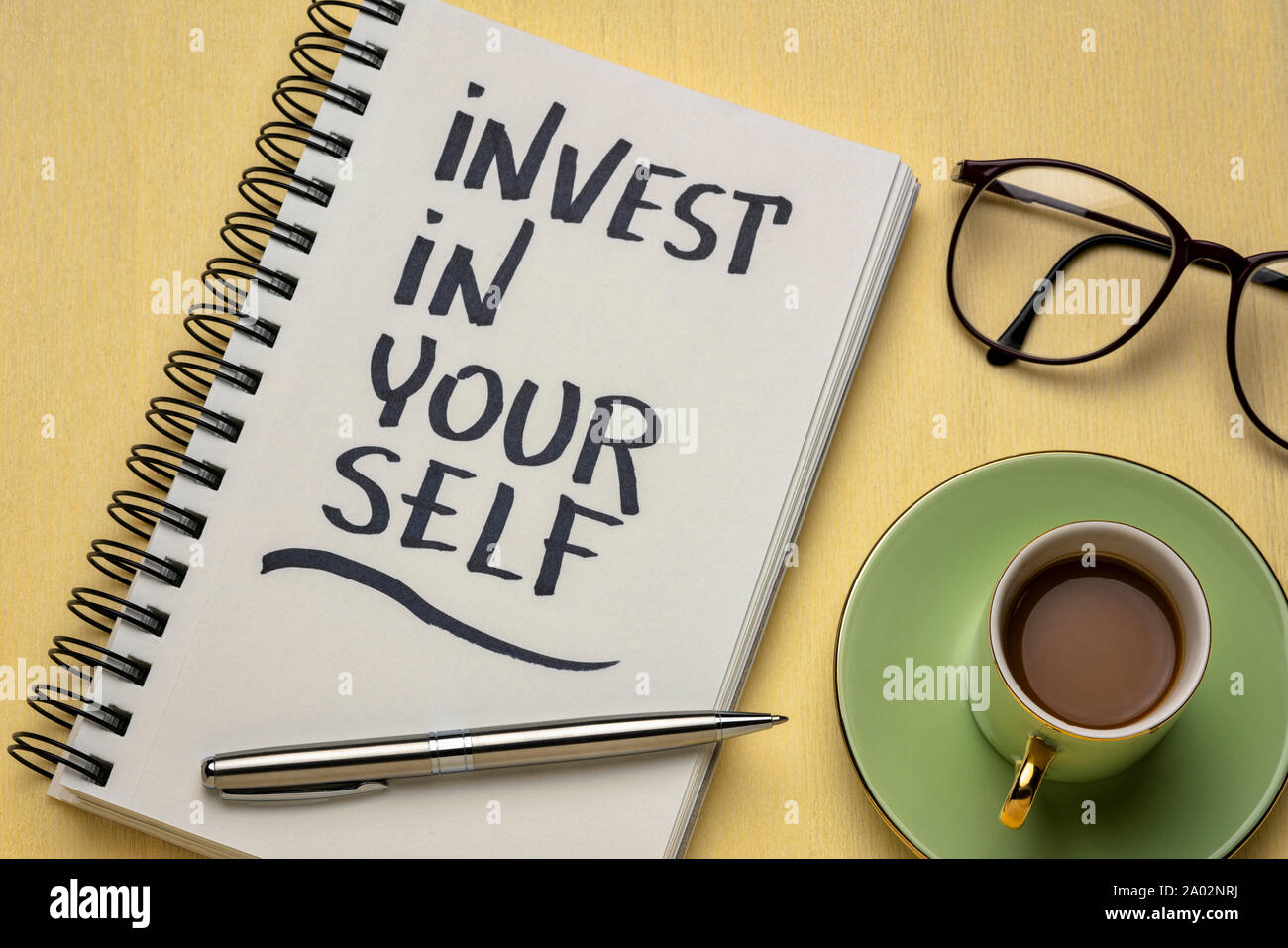 Invest in yourself motivational advice or reminder - handwriting in a ...