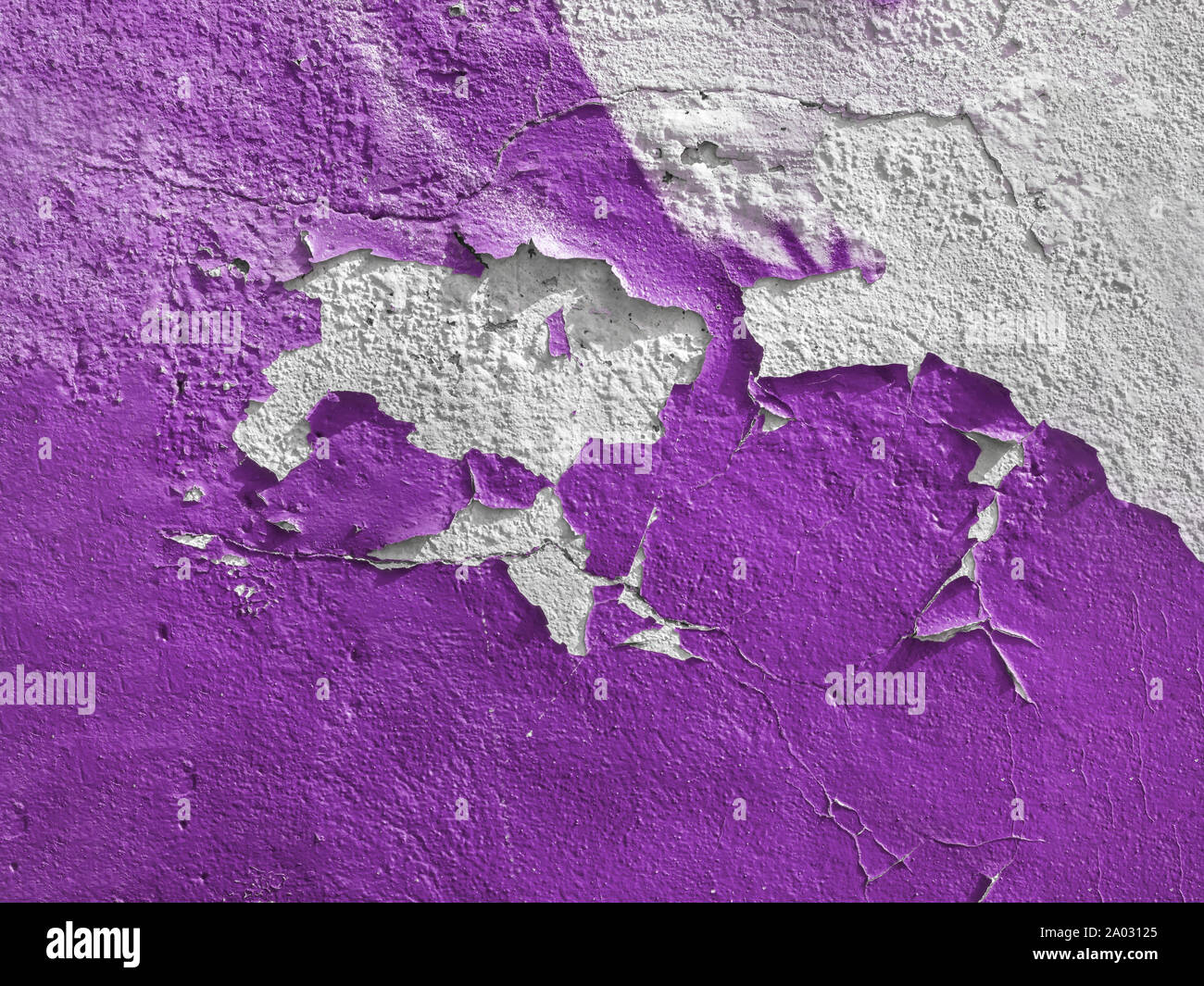 Violet wall with the peeled-off paint. It can be used as background ...