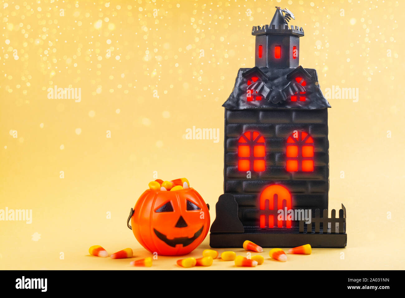 Haunted house and jack o lantern Stock Photo - Alamy