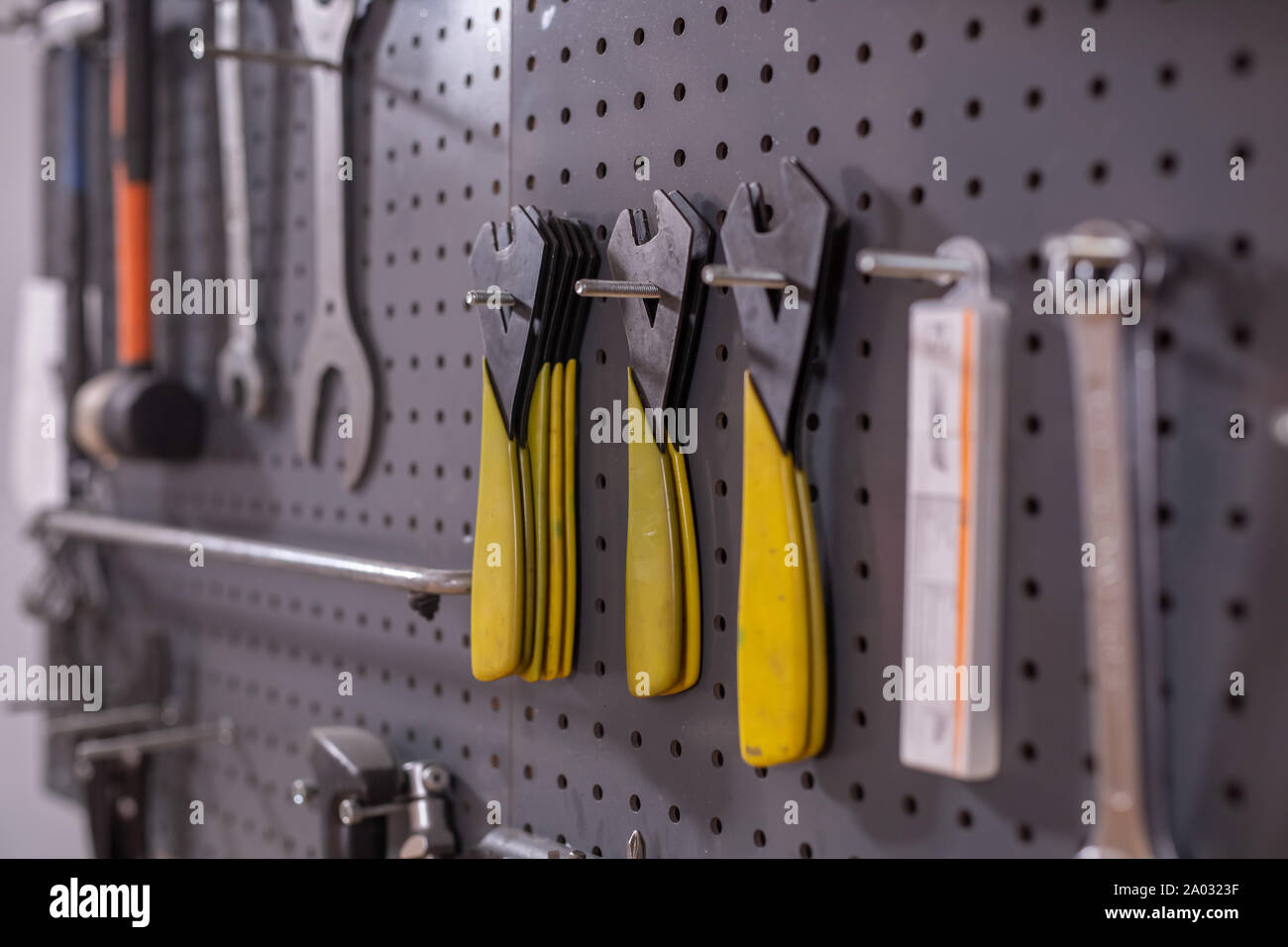 Set of tools, screws, pliers and nuts on a workshop background Stock ...