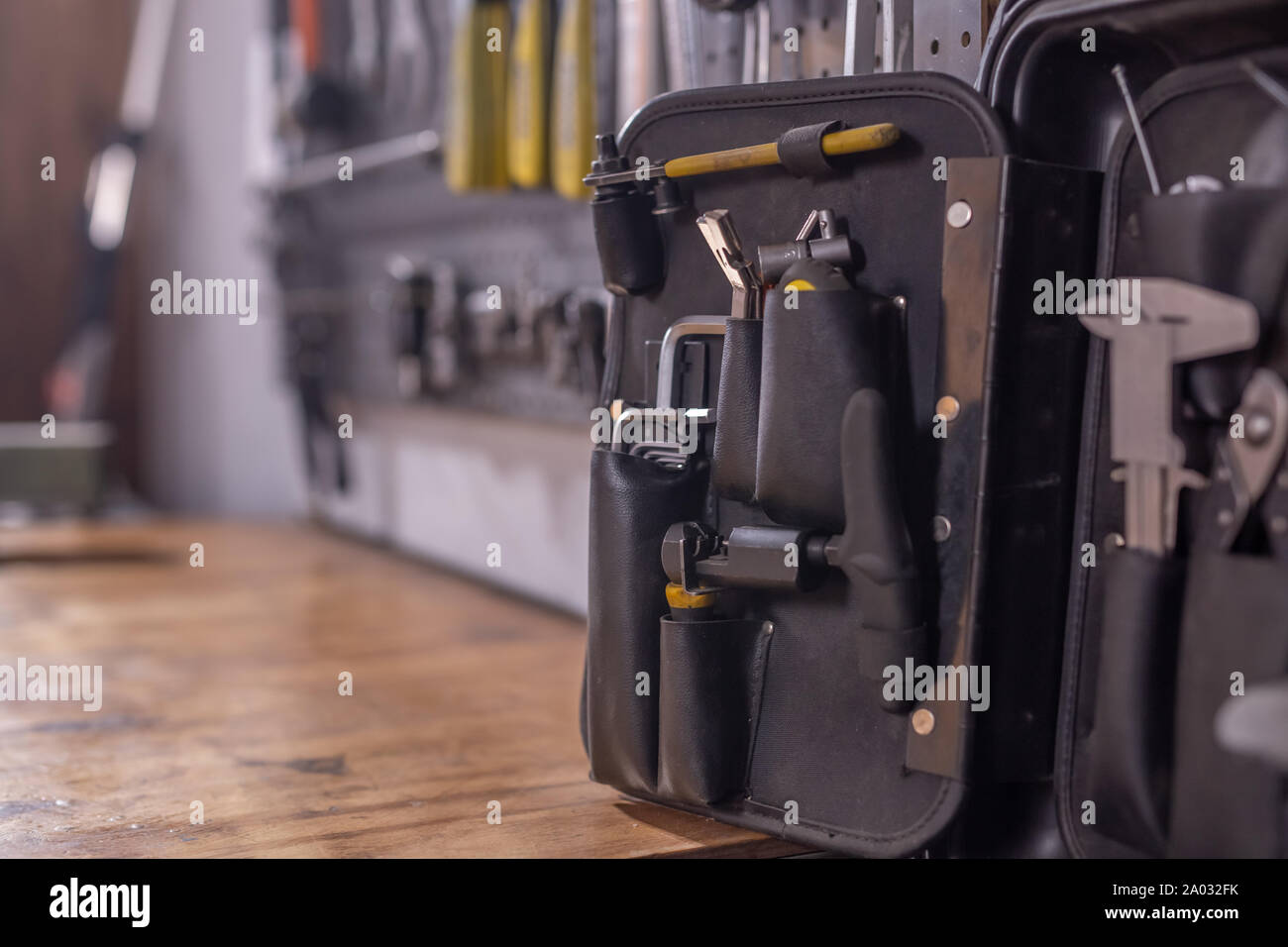 Set of tools, screws, pliers and nuts on a workshop background Stock ...