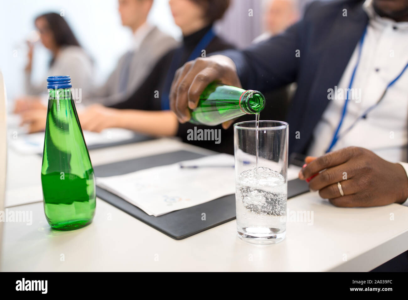 Black man drinking water glass hi-res stock photography and images - Alamy