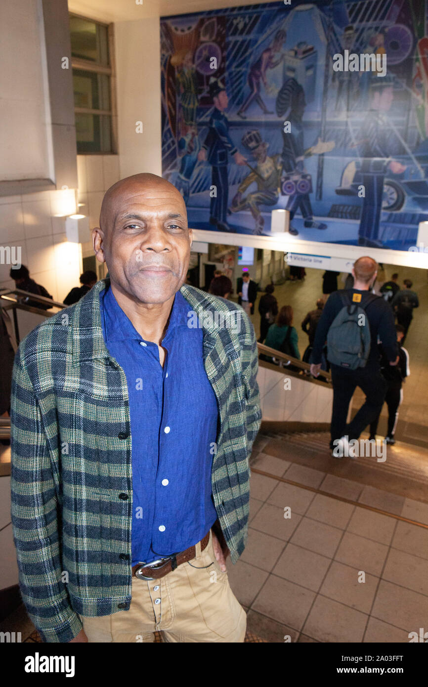 Artist Denzil Forrester poses at Brixton Underground station in from of ...