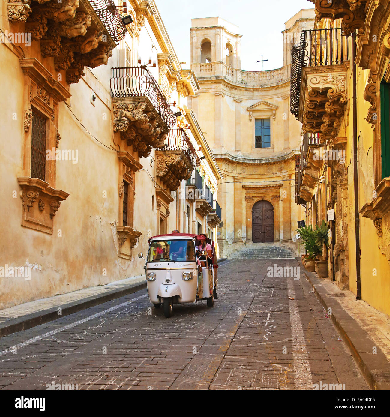 Old street of Noto with Piaggio car, Sicily Stock Photo - Alamy