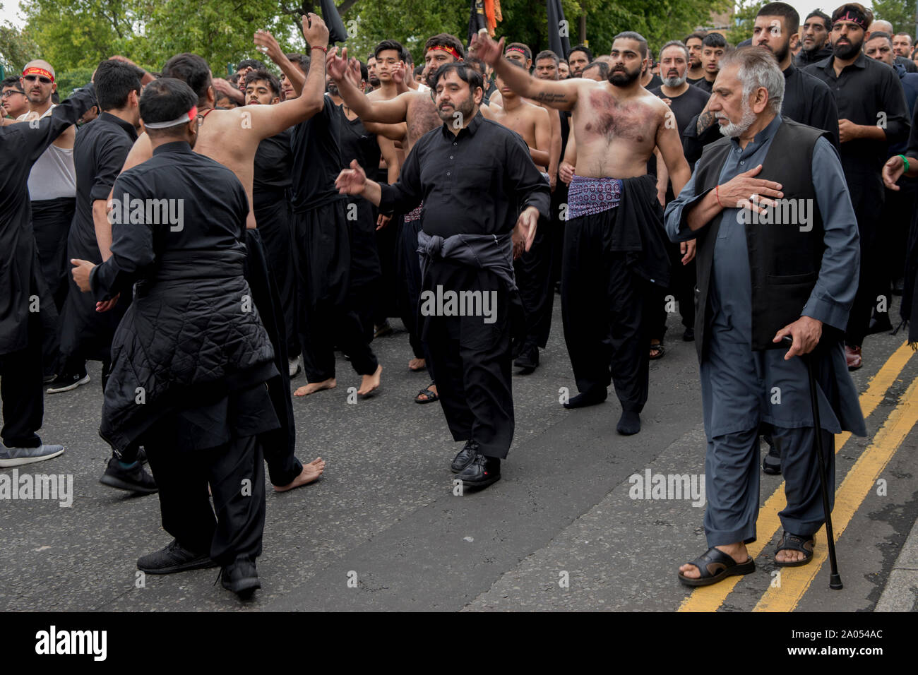 Bradford City of Culture. Ashura ritual, men beat their chest in ritual ...
