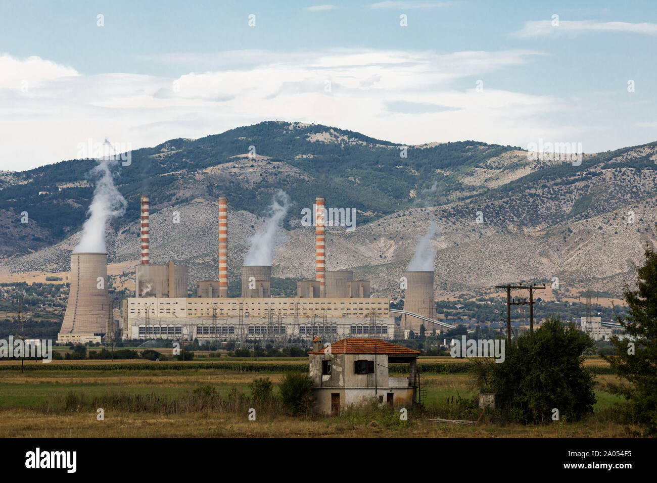 chemical factory throwing out polluting smoke from pipes. metallurgical ...