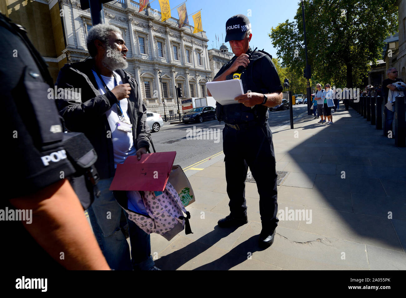 London, England UK. Police talking to a man in Whitehall Stock Photo ...