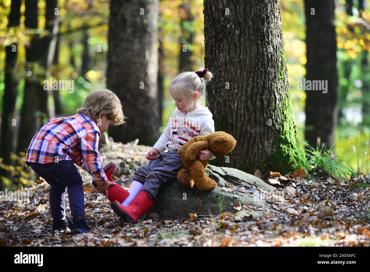 Siblings care for each other. Portrait of brother feeling caring and ...