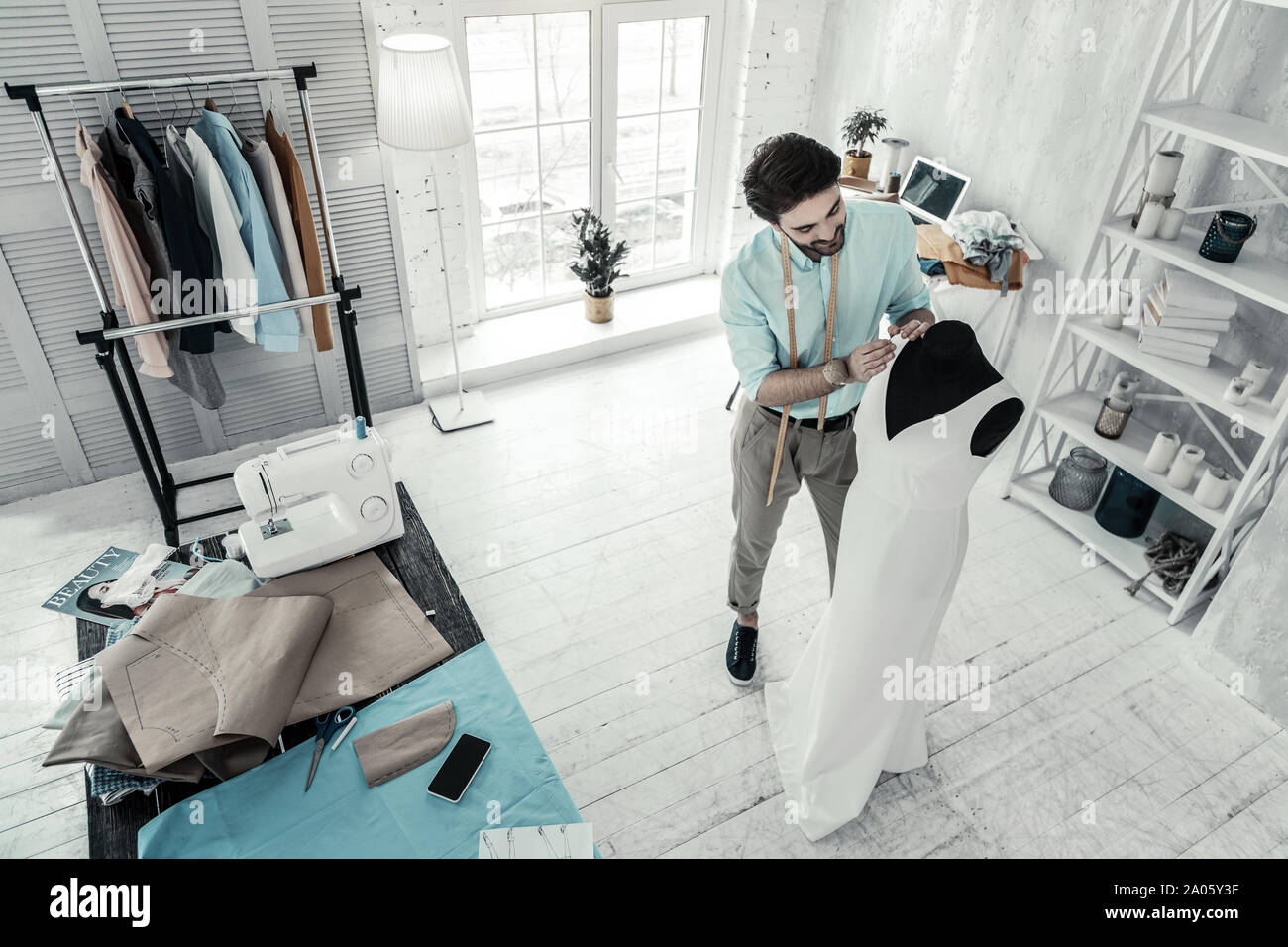 Professional designer working at his collection with pleasure Stock ...