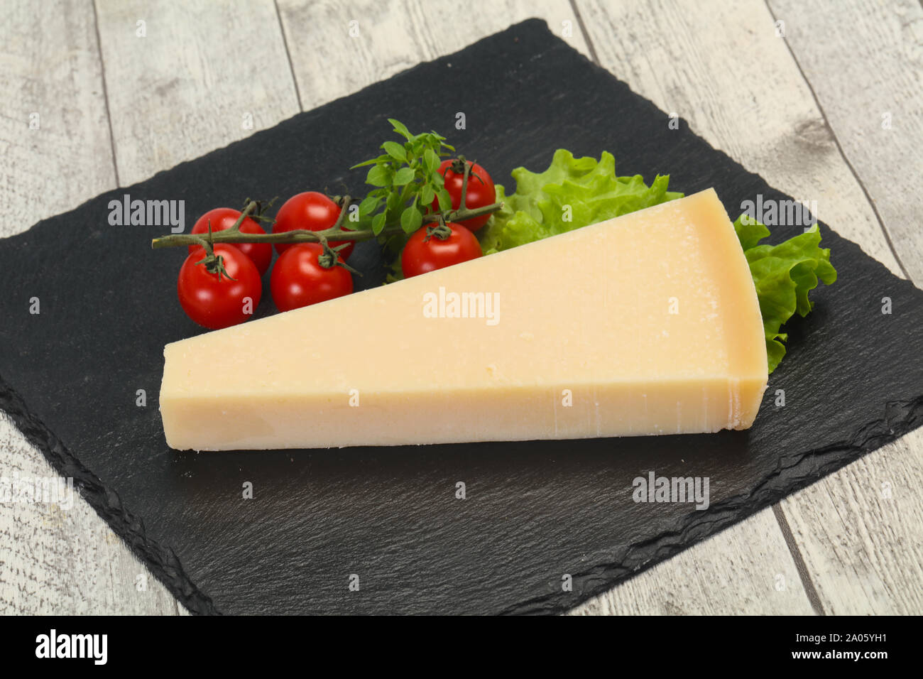 Italian traditional parmesan cheese triangle served salad Stock Photo ...