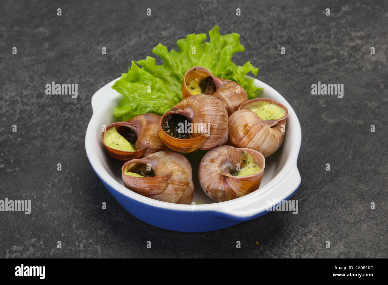 French cuisine - Escargot with butter sauce Stock Photo - Alamy