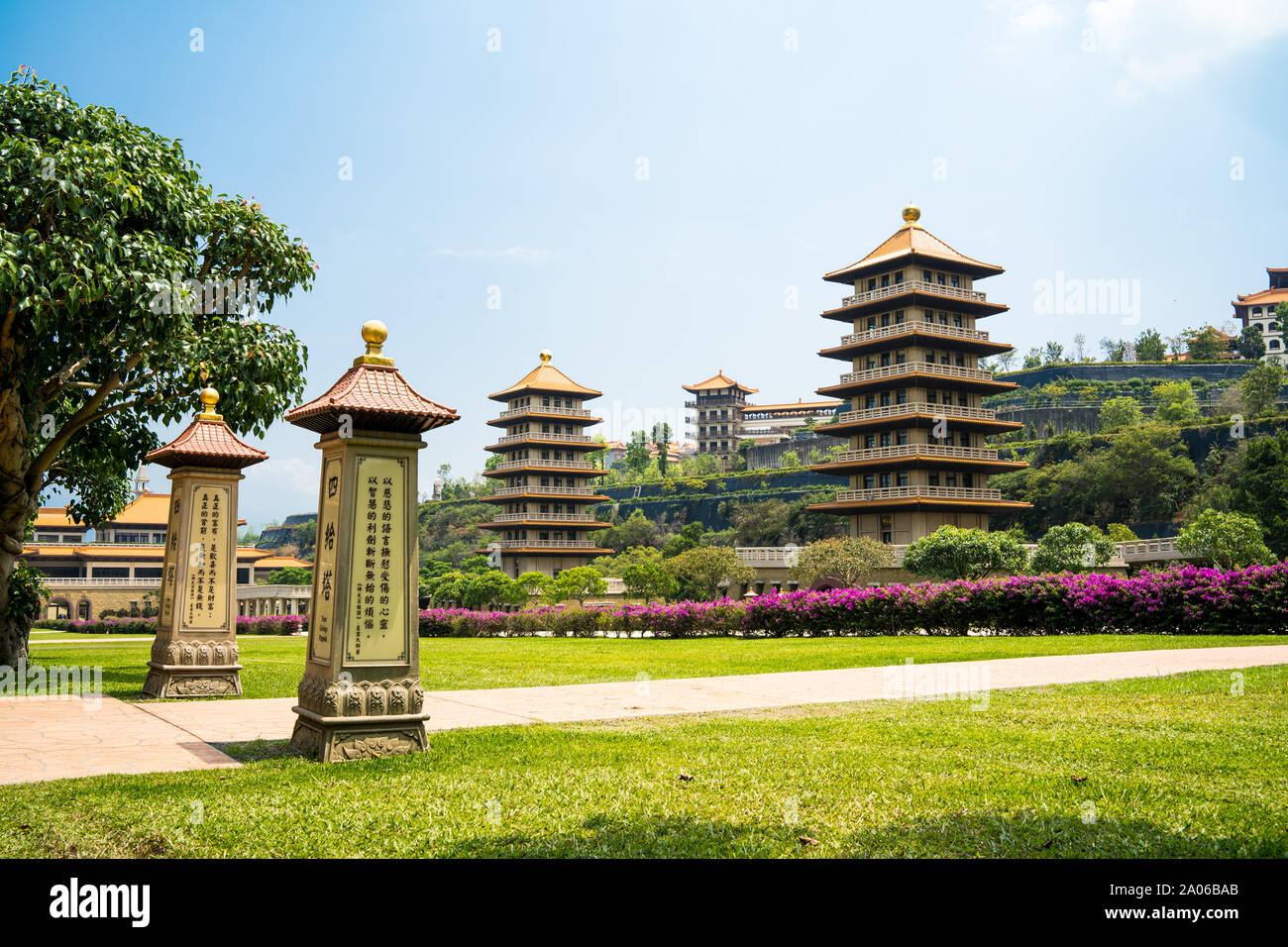Kaohsiung, Taiwan: Small ceramonial garden pagodas with tall Pagoda ...