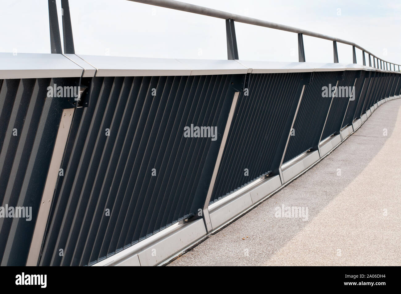 railing of metal bars and handrail of stainless steel at footbridge ...