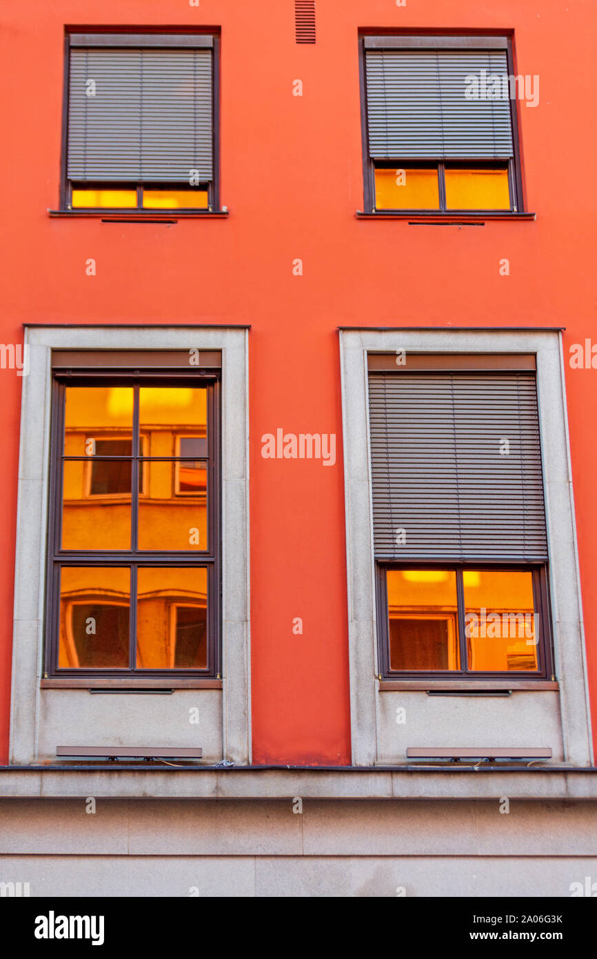 Modern Windows With Golden Glass Building Exterior Stock Photo - Alamy