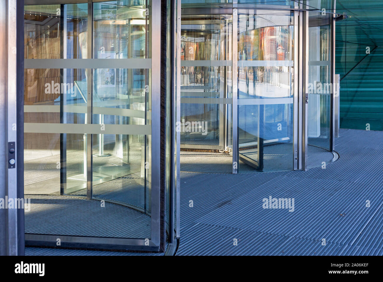Automatic Revolving Doors at Modern Building Entrance Stock Photo - Alamy