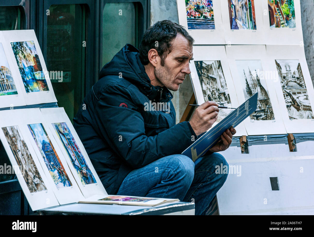 Street artist painting in Rome Stock Photo - Alamy