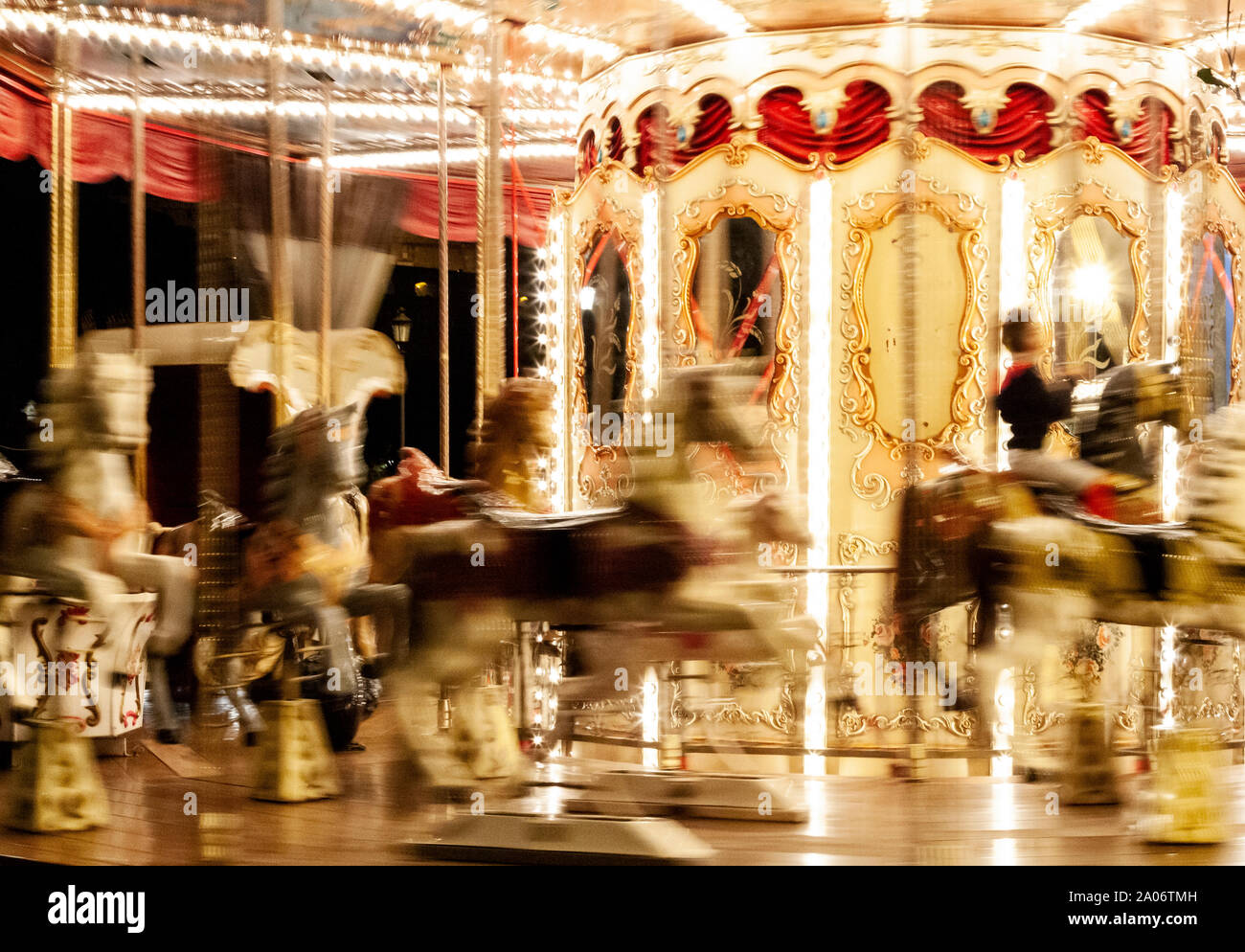 fairground carousel at night with motion blur Stock Photo - Alamy