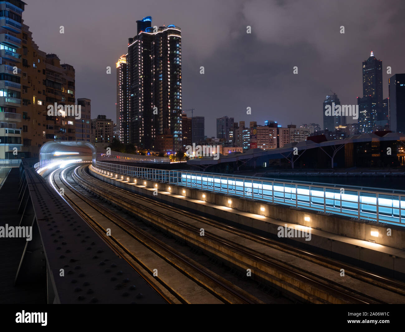 The Kaohsiung light rail track near love pier station at night ...