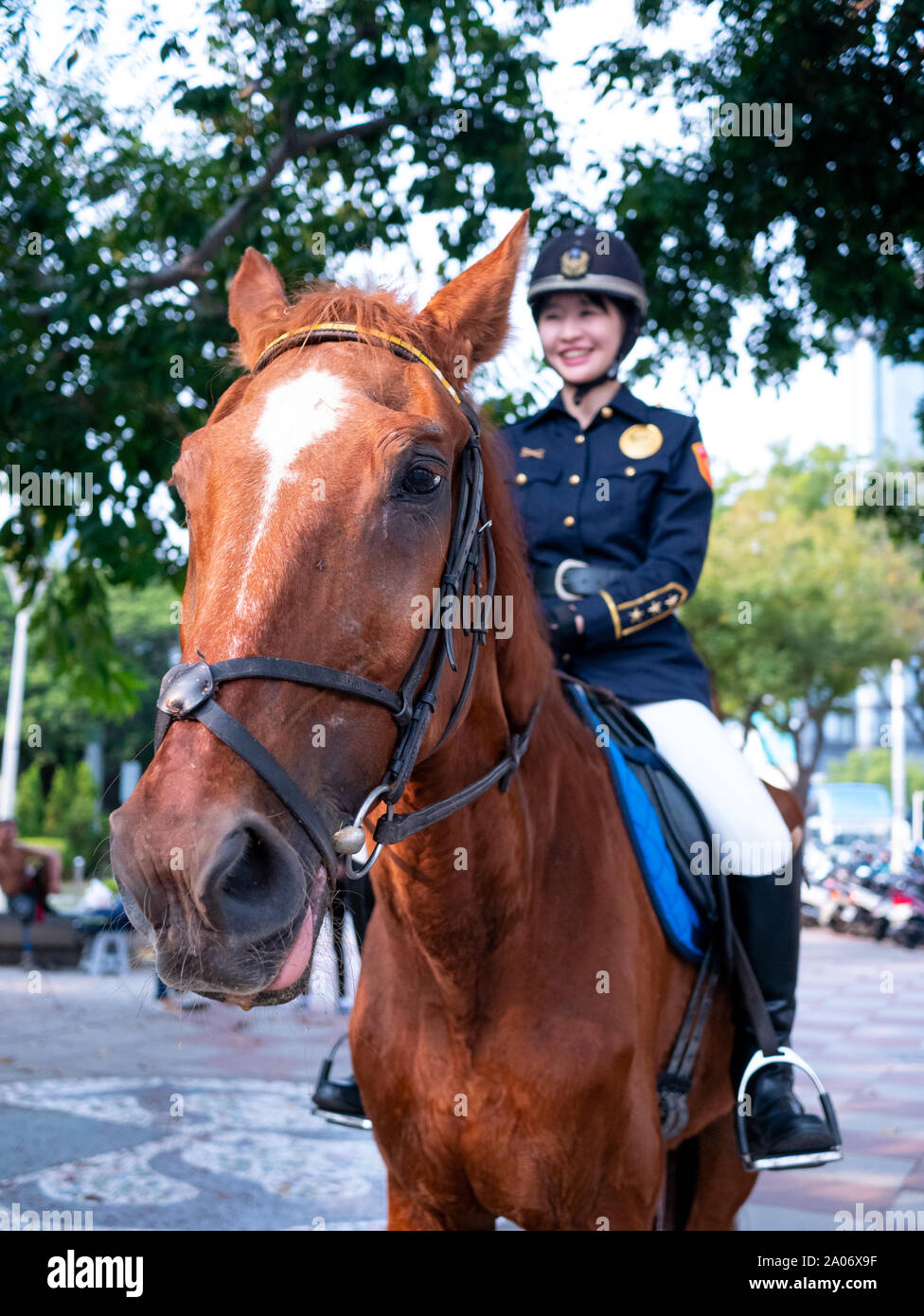 Female police officer riding horse hi-res stock photography and images ...