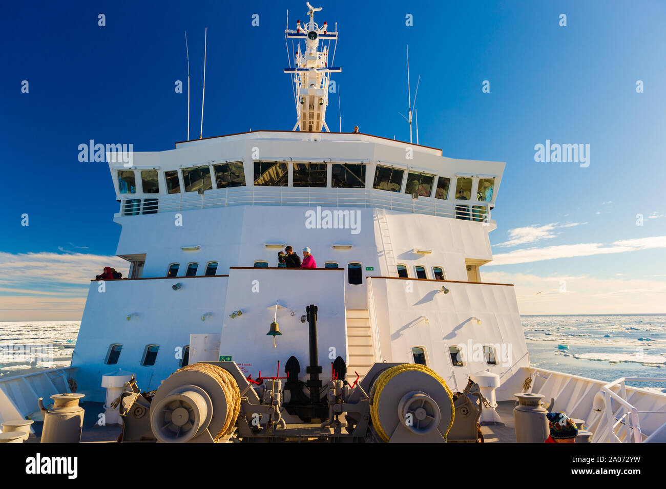 Bridge of the National Geographic Explorer ship in a fijord in Svalbard ...