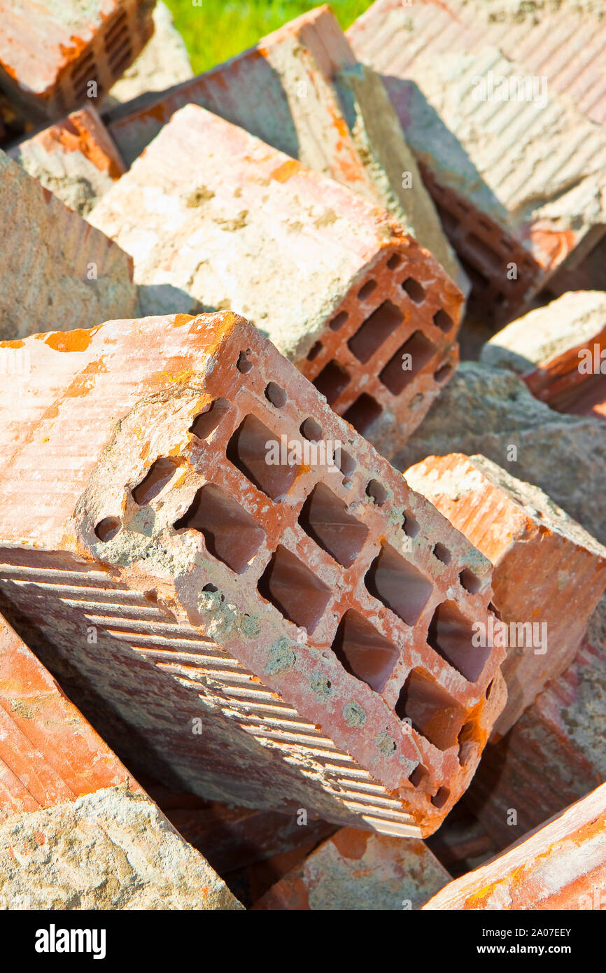 Concrete and brick rubble debris on construction site after a ...