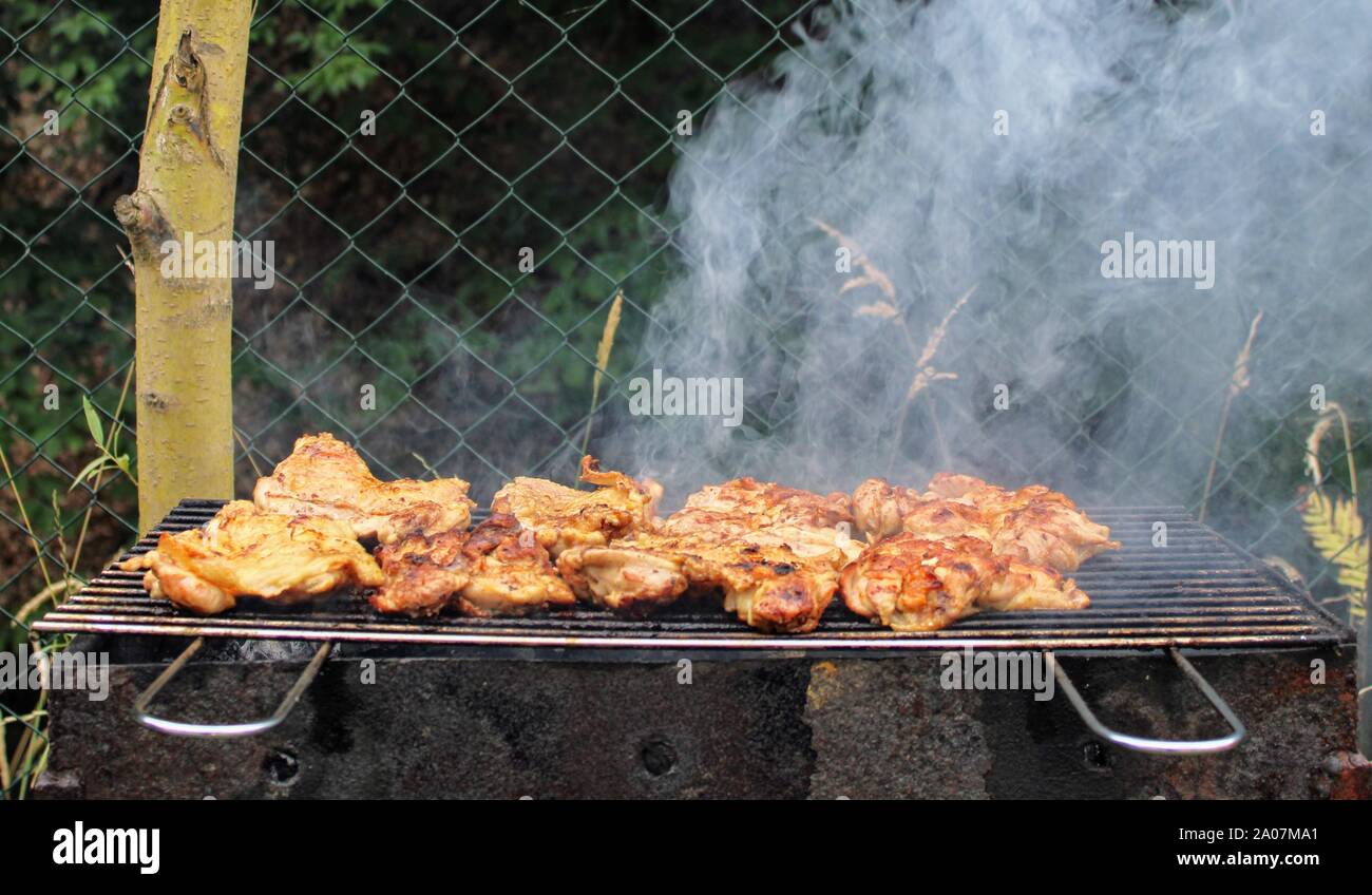 Old and rusty barbecue with charcoal prepared for roasting meat Stock ...