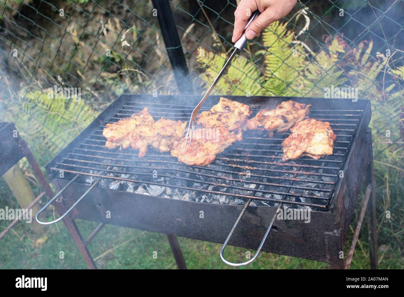 Old rusty barbecue hi-res stock photography and images - Alamy