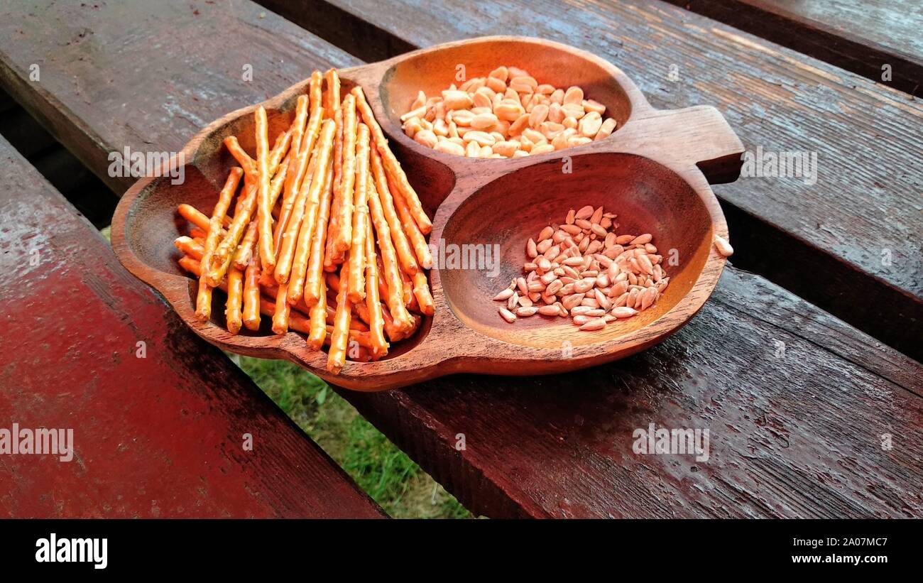 Leaf shaped wooden bowl with three cavities for nuts or snacks Stock ...