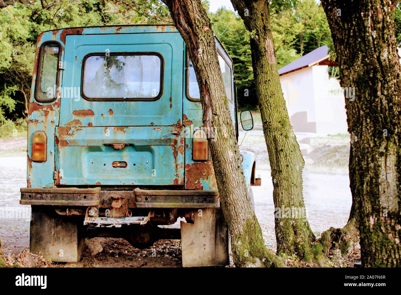 Old and rusty SUV abandoned in the vicinity of the forest in Romania ...