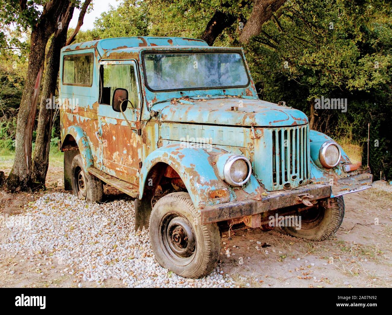 Old and rusty SUV abandoned in the vicinity of the forest in Romania ...