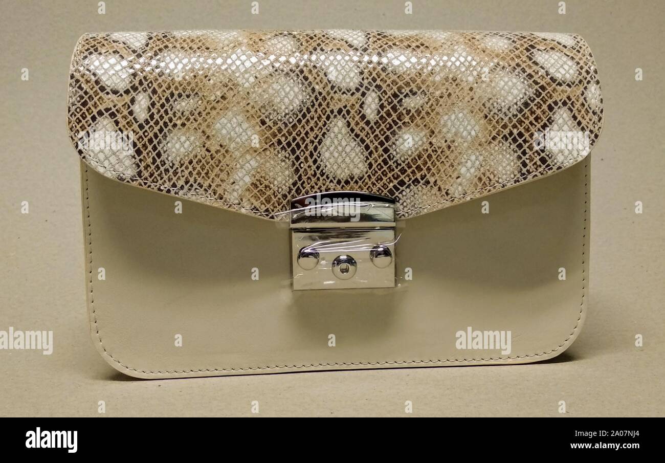 Cream colored clutch bag hi-res stock photography and images - Alamy