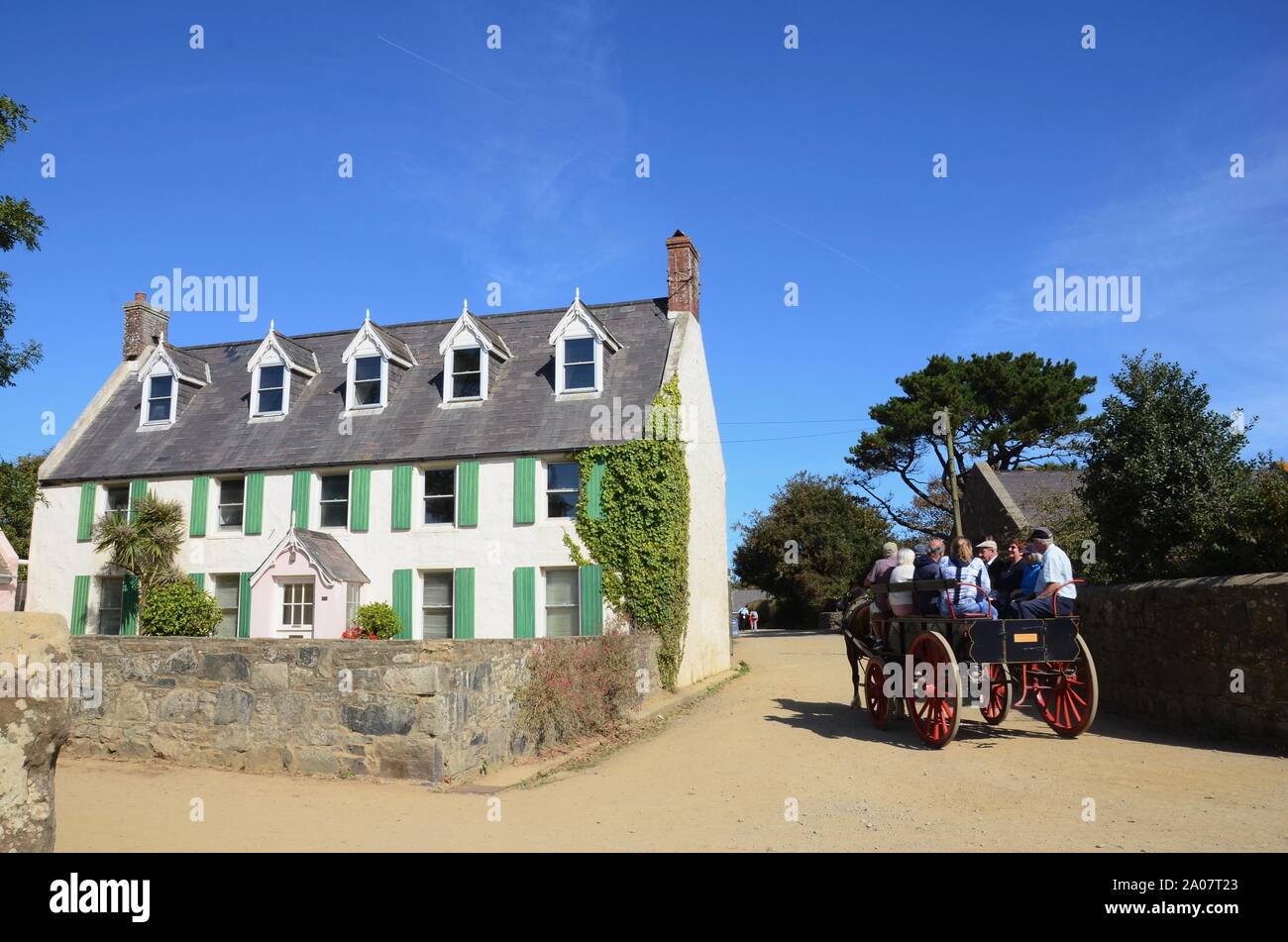 Horses and carriage taking tourists around Sark, Channel Islands, UK ...