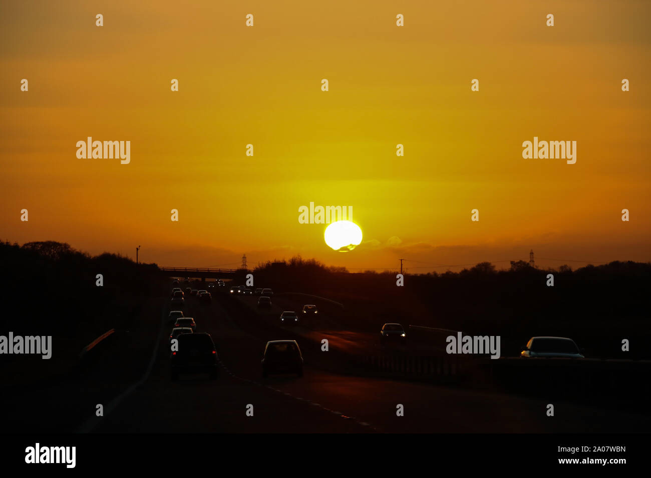 Setting sun on highway hi-res stock photography and images - Alamy