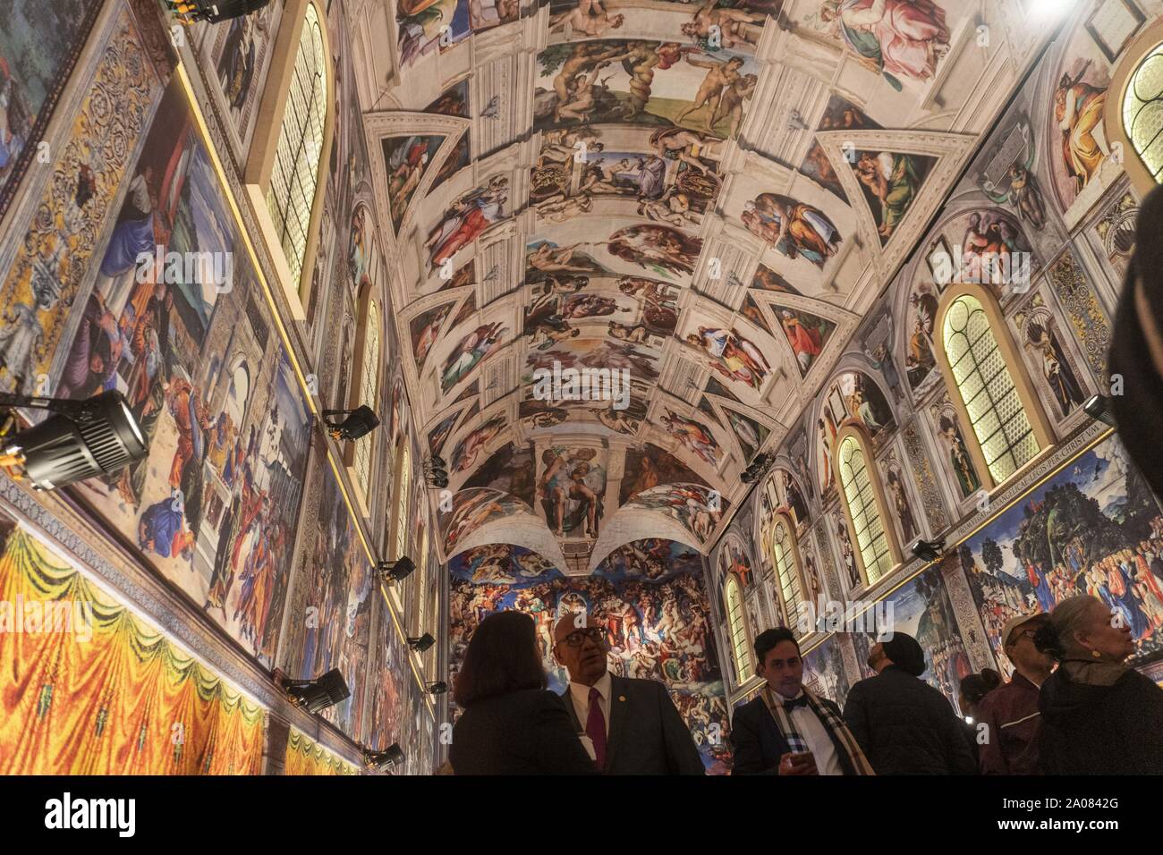 June 4, 2019: People observing the exhibition of the Sistine Chapel in ...