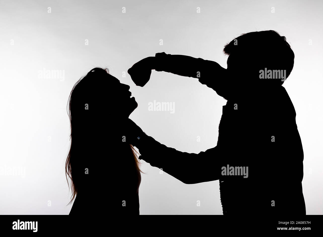 Aggression and abuse concept - man and woman expressing domestic ...