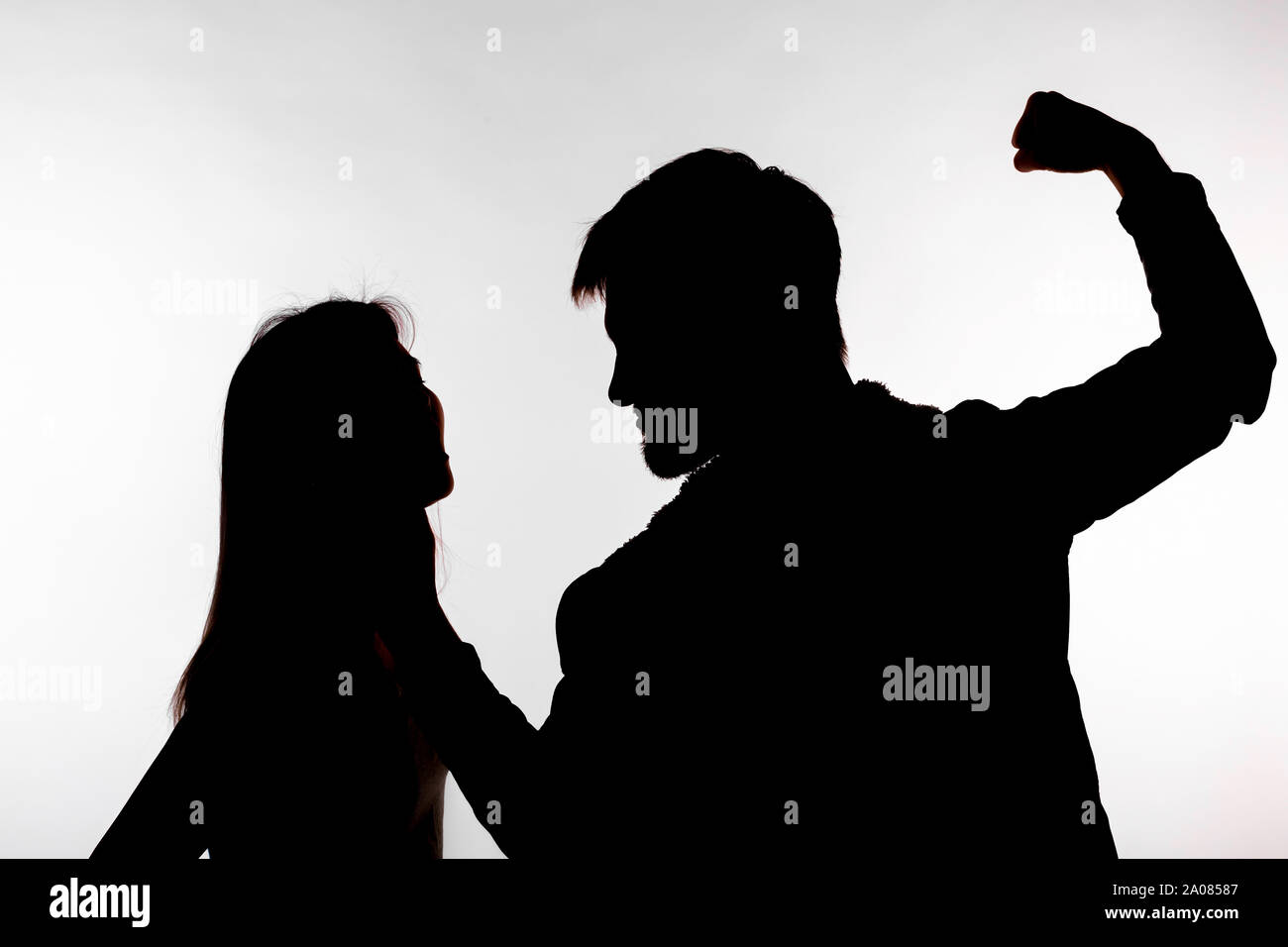Aggression and abuse concept - man and woman expressing domestic ...